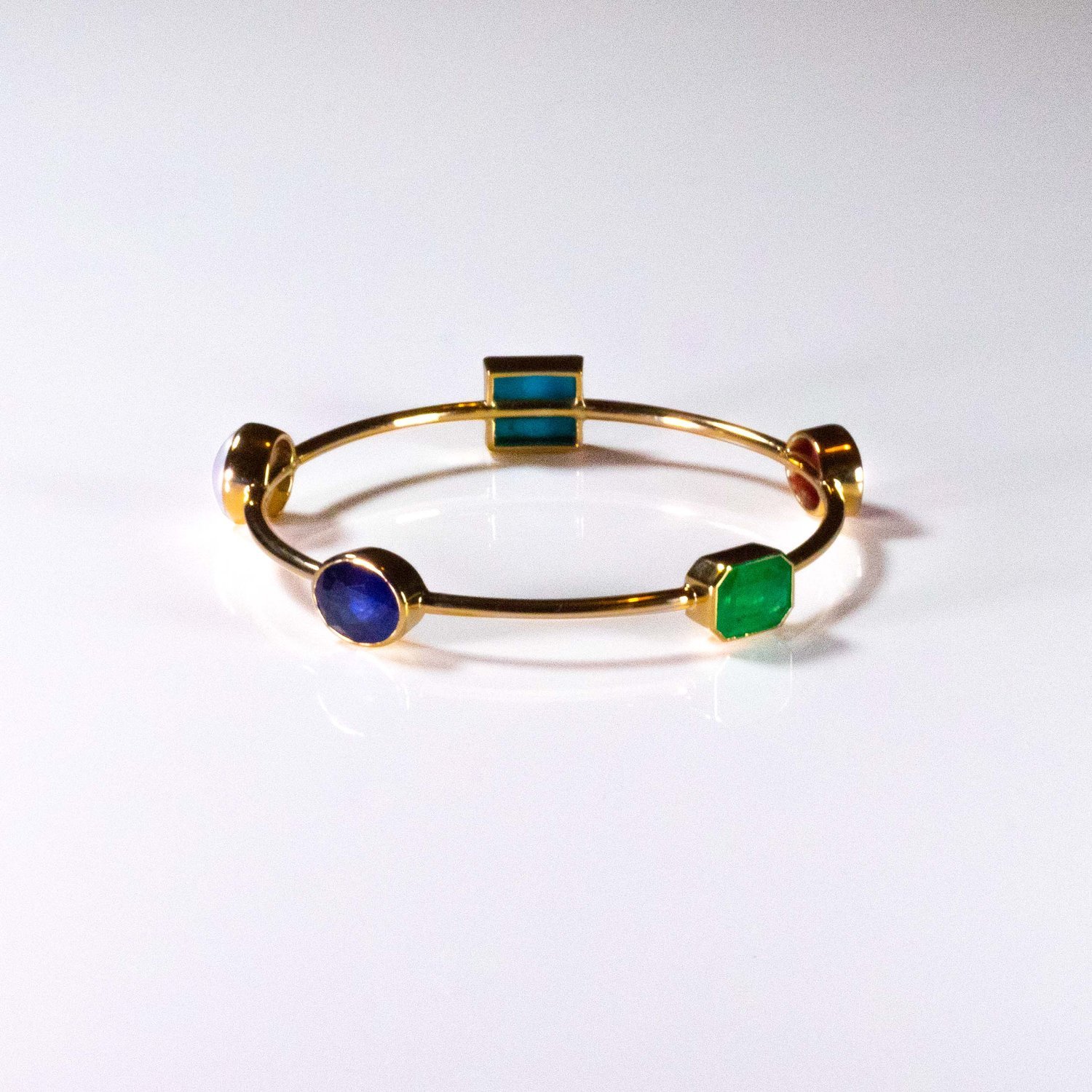 Discover Multi-Stone Gold Bangles at Clio Jewellery in Dubai